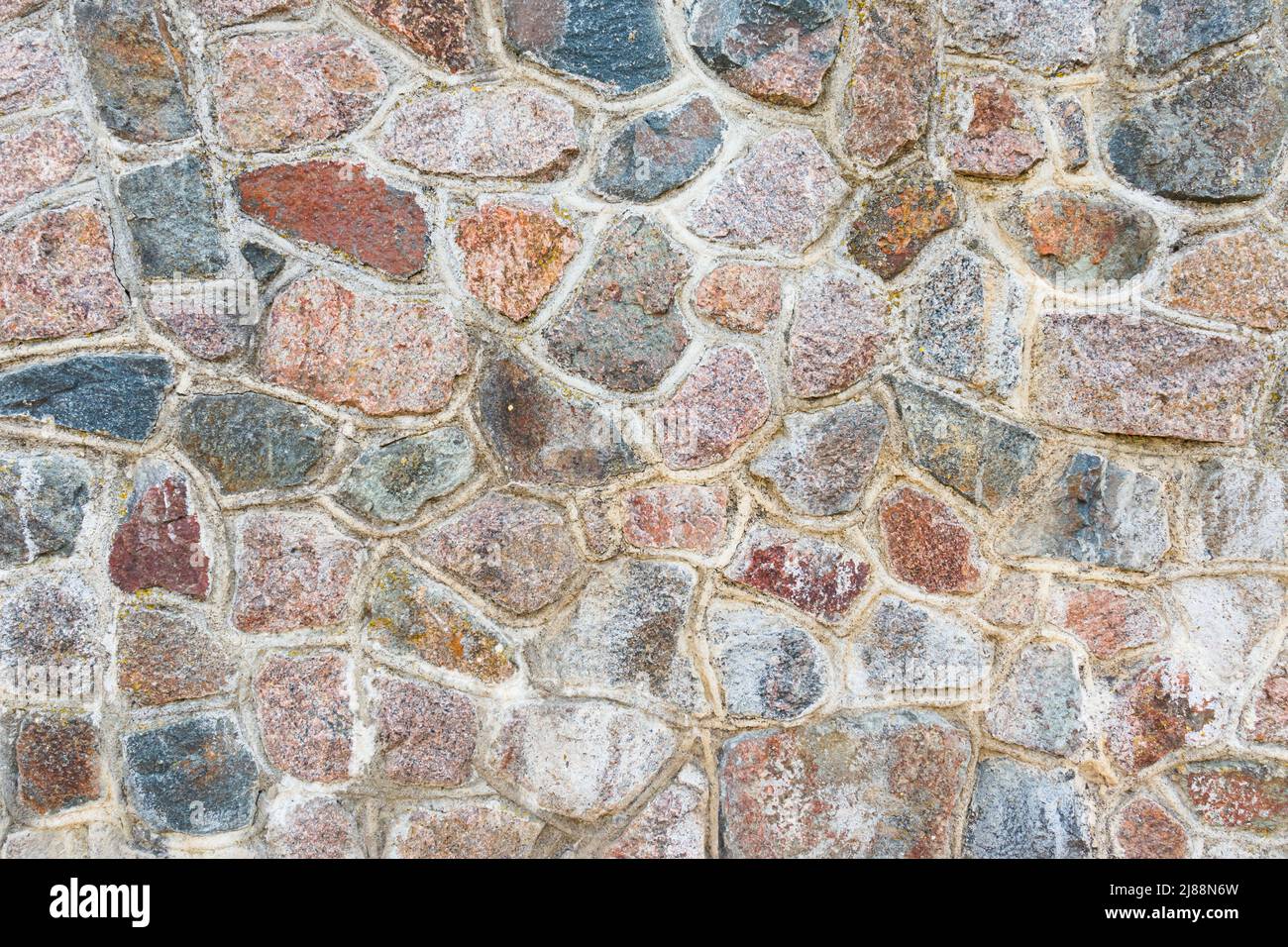 A close-up of the stone wall. The texture of masonry is made of multi ...