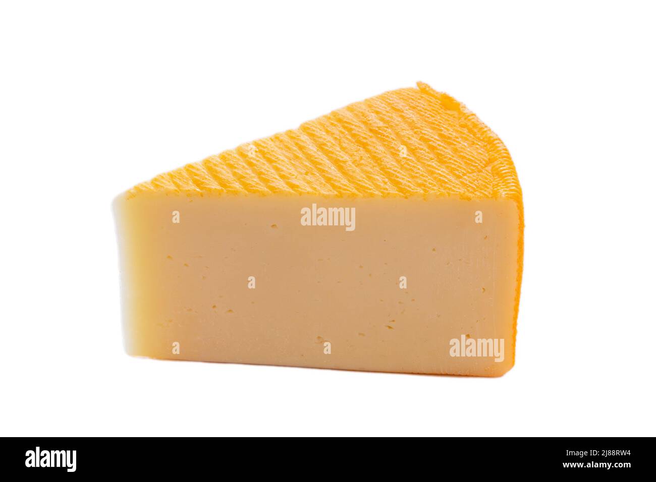 semi firm uncooked cheese isolated on white background Stock Photo - Alamy