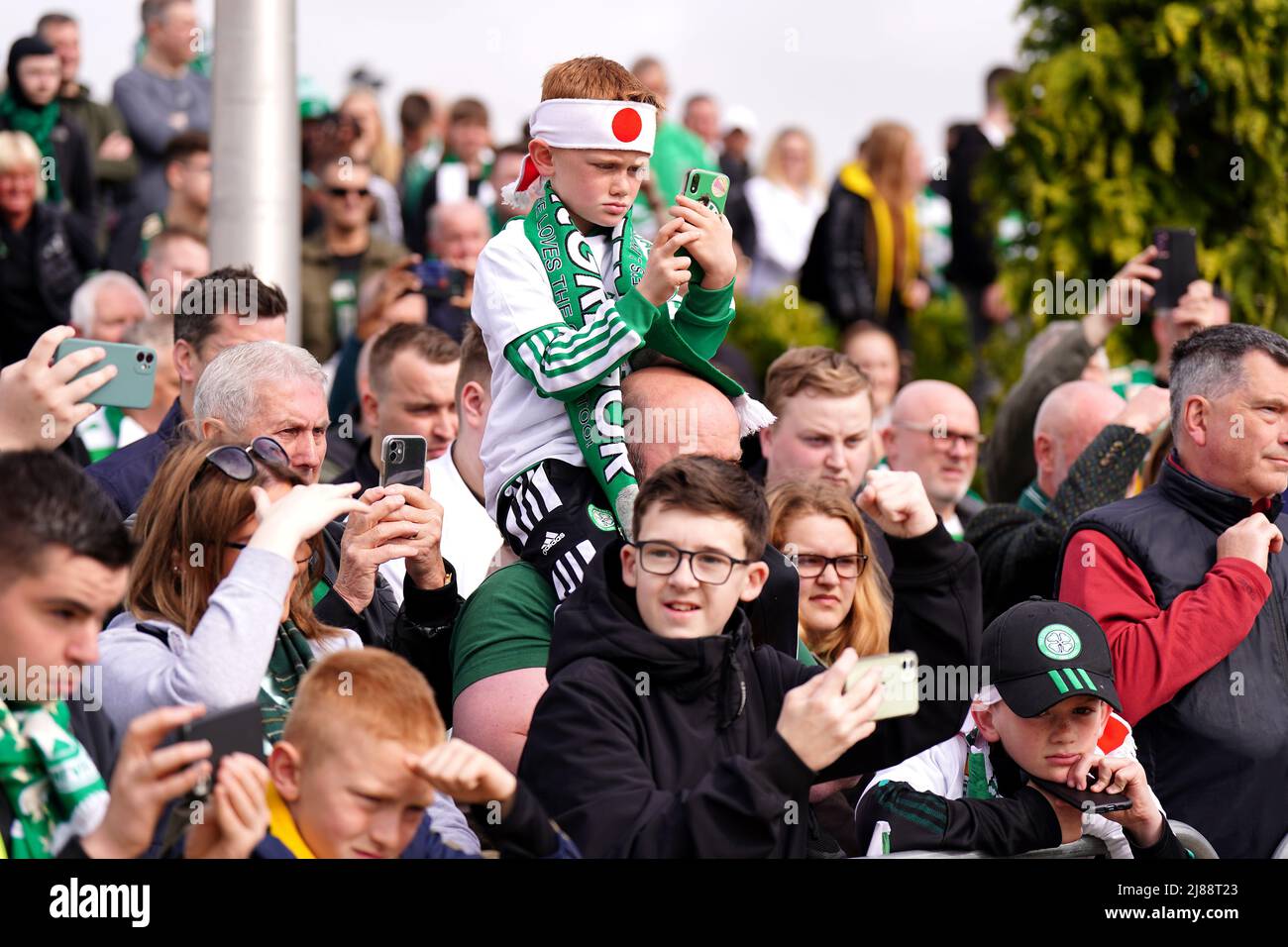 Celtic fans celebrate the team winning the league before the cinch ...