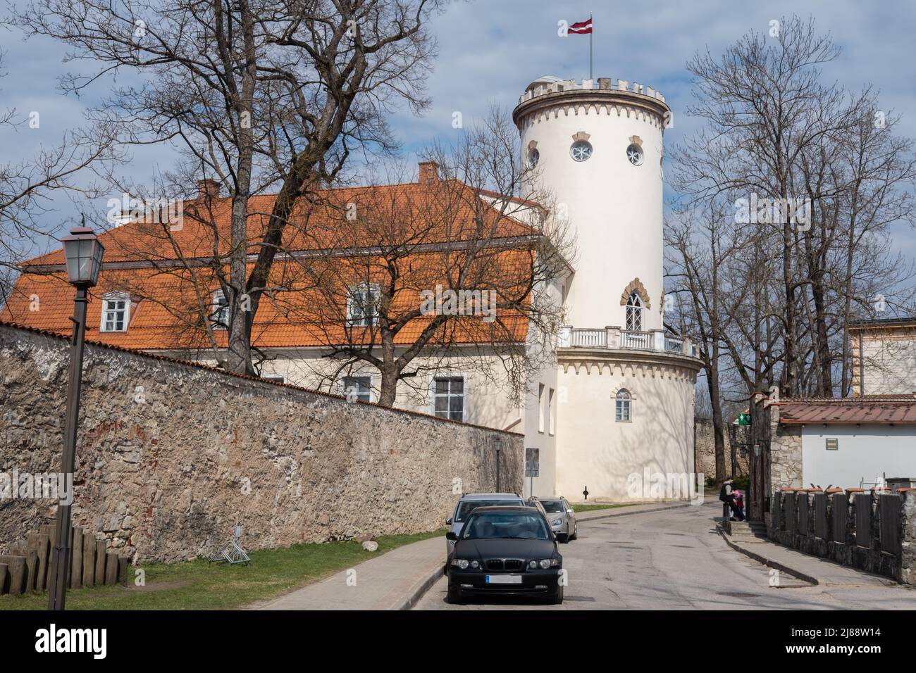 Medieval castle with Latvian flag on it in Cesis, Latvia Stock Photo ...