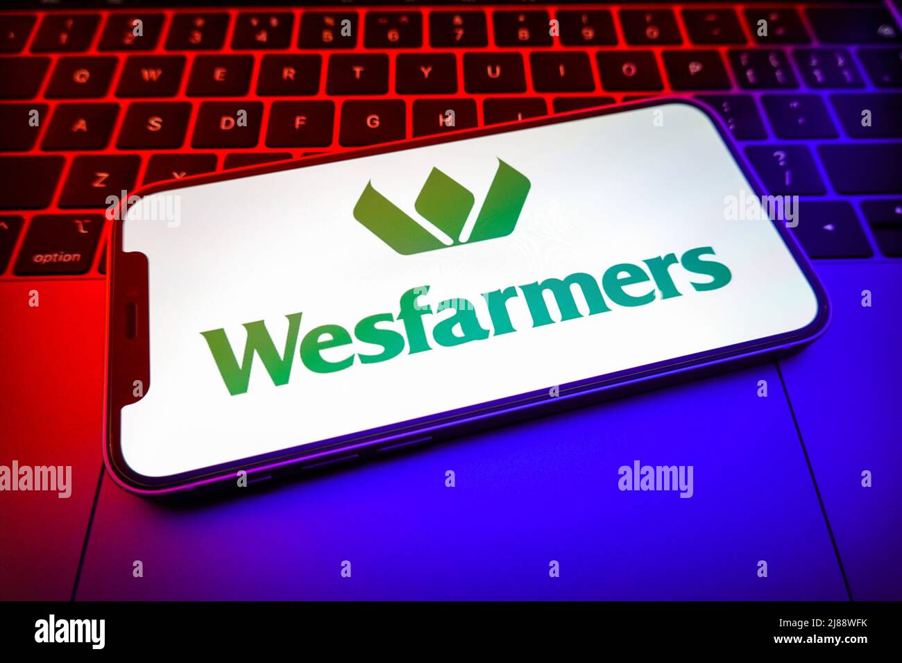 In this photo illustration, a Wesfarmers logo is displayed on the screen of a smartphone. (Photo ...