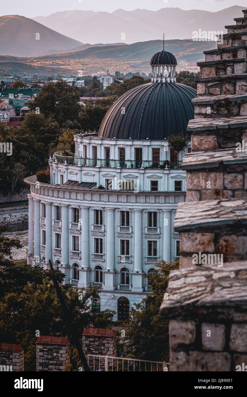 A shot at sunset from Skopje fortress, peering over the fortress/castle ...