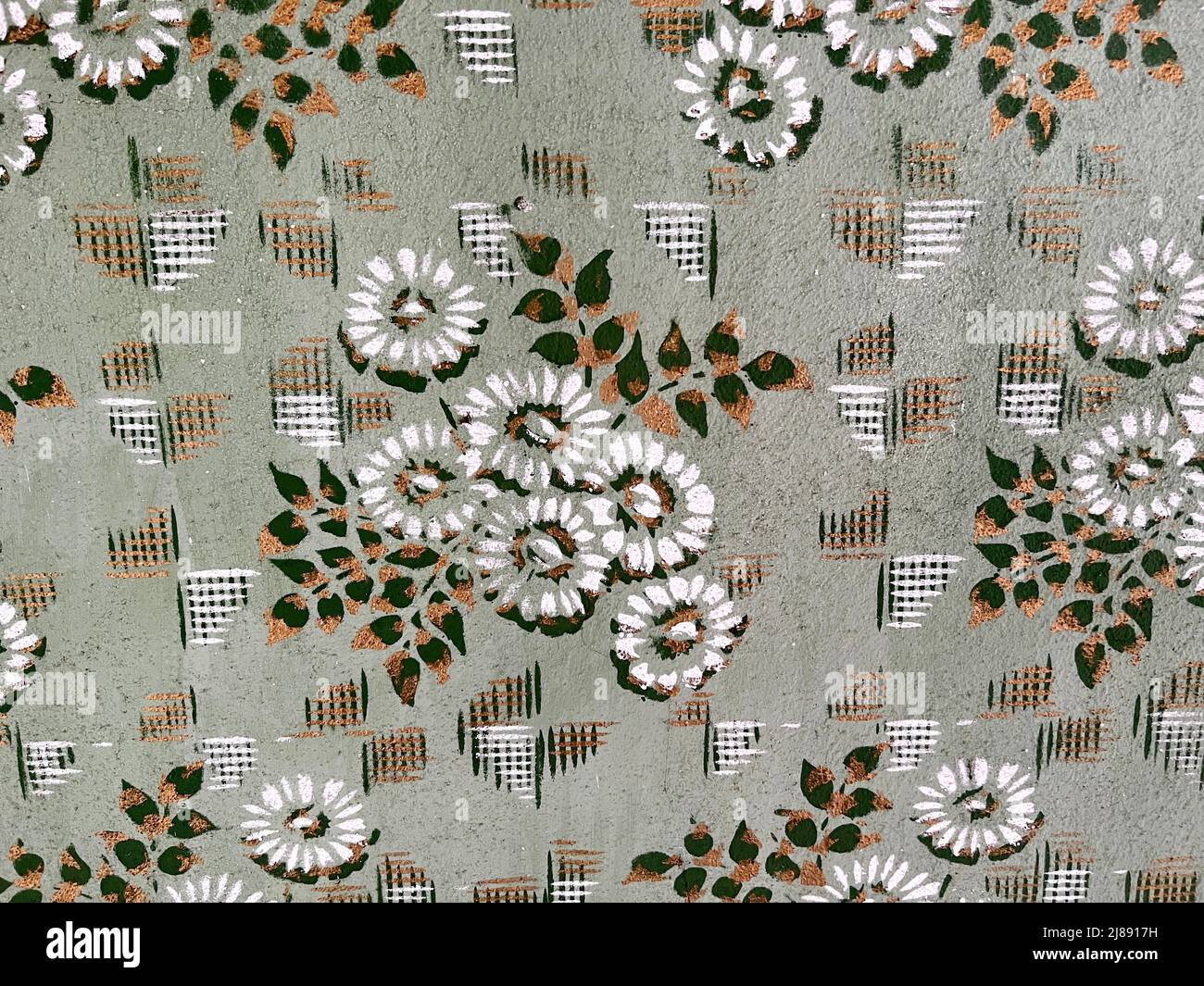 Seamless decorative vintage flower shaped painting on a wall of old ...