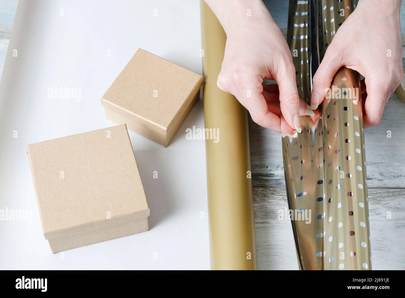 How to wrap and decorate christmas gift. Step by step, tutorial Stock ...