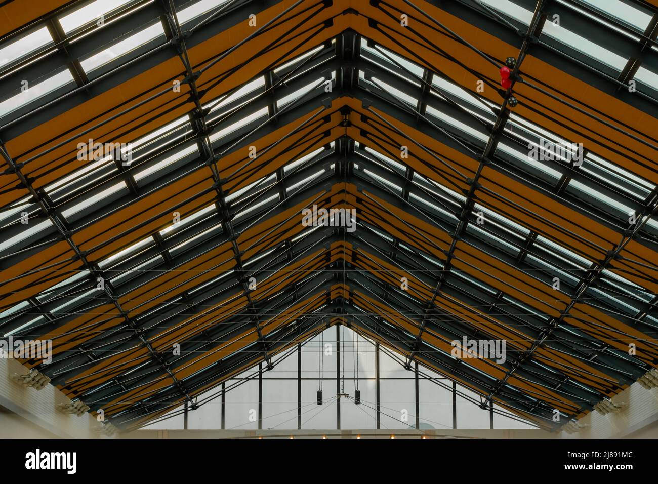 Metal roof structure interior, roofing of shopping mall Stock Photo - Alamy