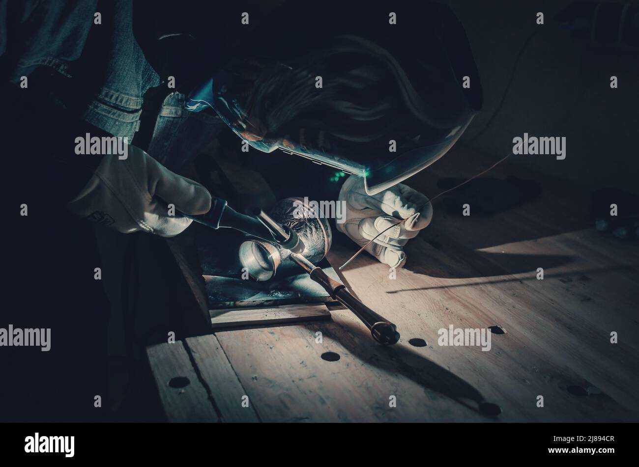 Man welding in uniform hi-res stock photography and images - Alamy