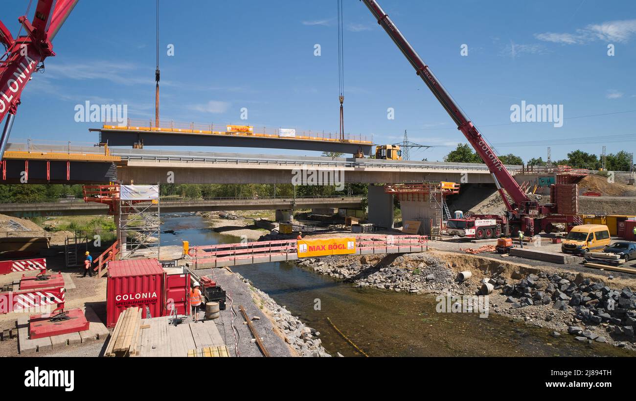 Sinzig, Germany. 14th May, 2022. Two truck-mounted cranes have begun ...