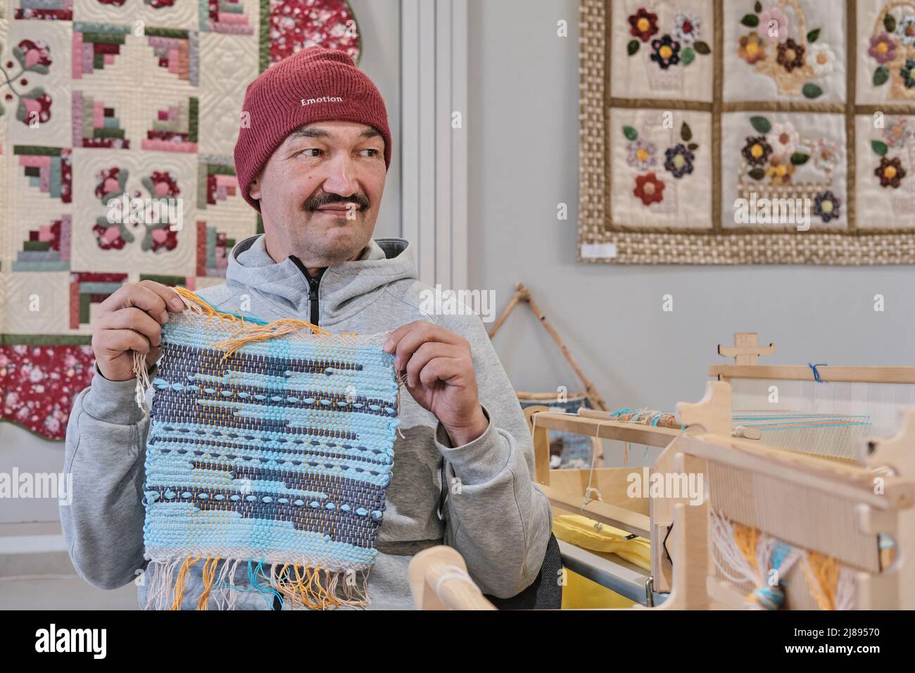 The first weaving loom hi-res stock photography and images - Alamy