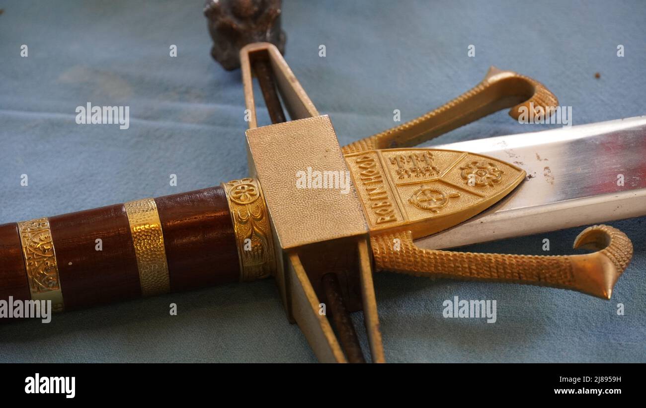 Fantasy beautiful medieval sword with the bronze handle Stock Photo - Alamy