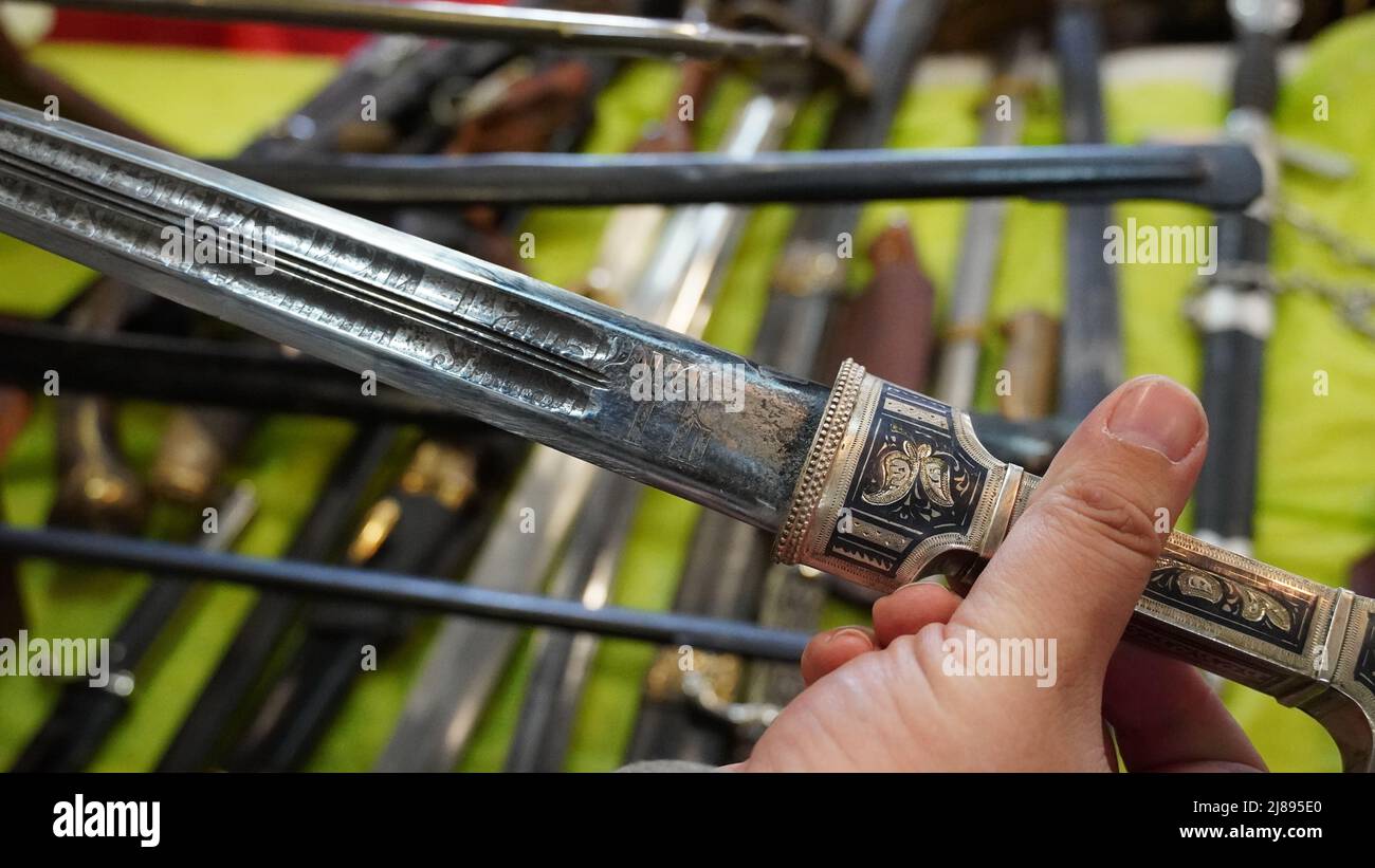 Kinzhal is a dagger, often with a single off-set groove on each face of ...