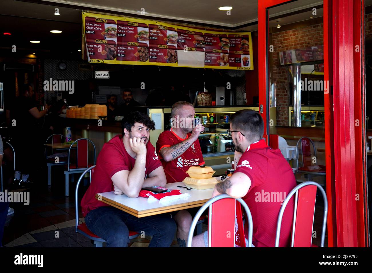 Liverpool fans inside a fast-food restaurant ahead of the Emirates FA ...