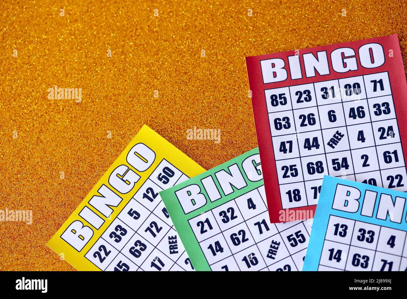 Many colorful bingo boards or playing cards for winning chips. Classic ...