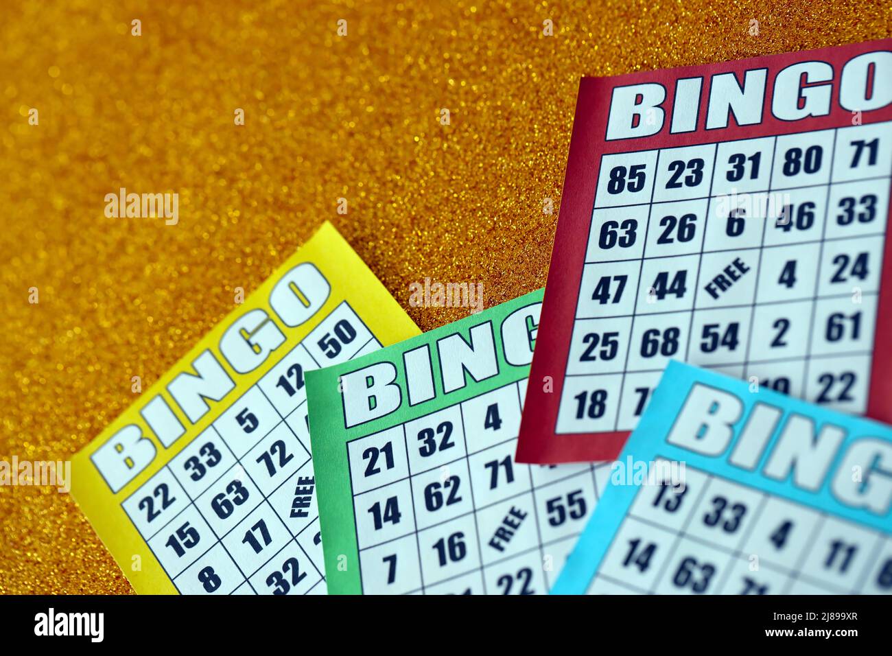 Many colorful bingo boards or playing cards for winning chips. Classic ...