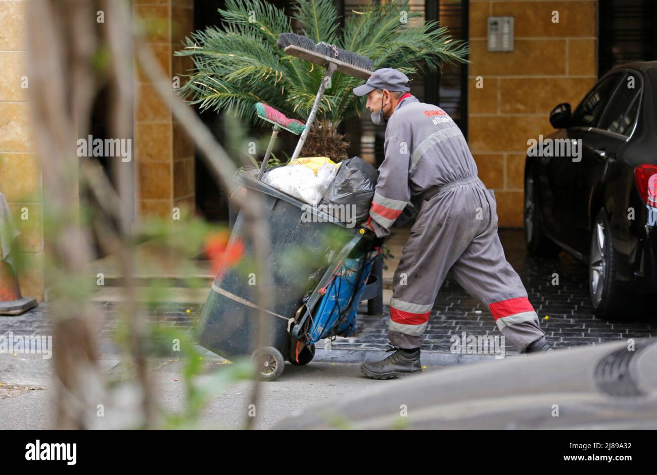 Beirut, Lebanon. 14th May, 2022. A cleaner collects waste in Beirut ...