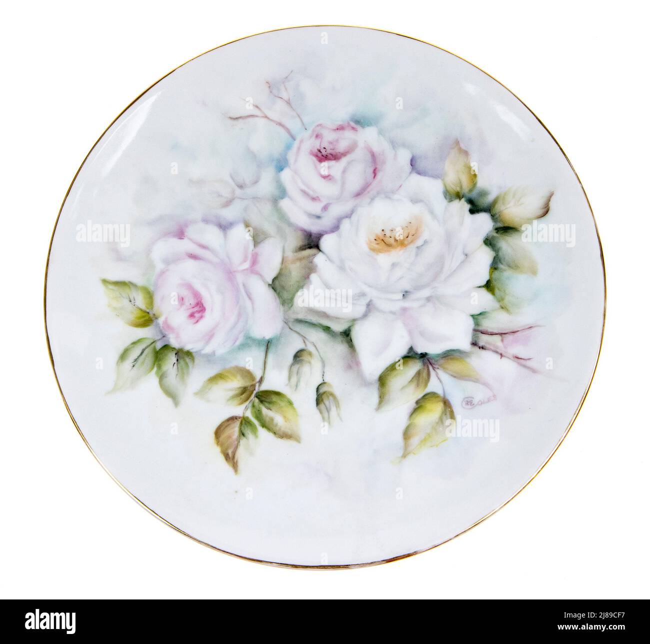 Hand painted plate with rose design Stock Photo - Alamy
