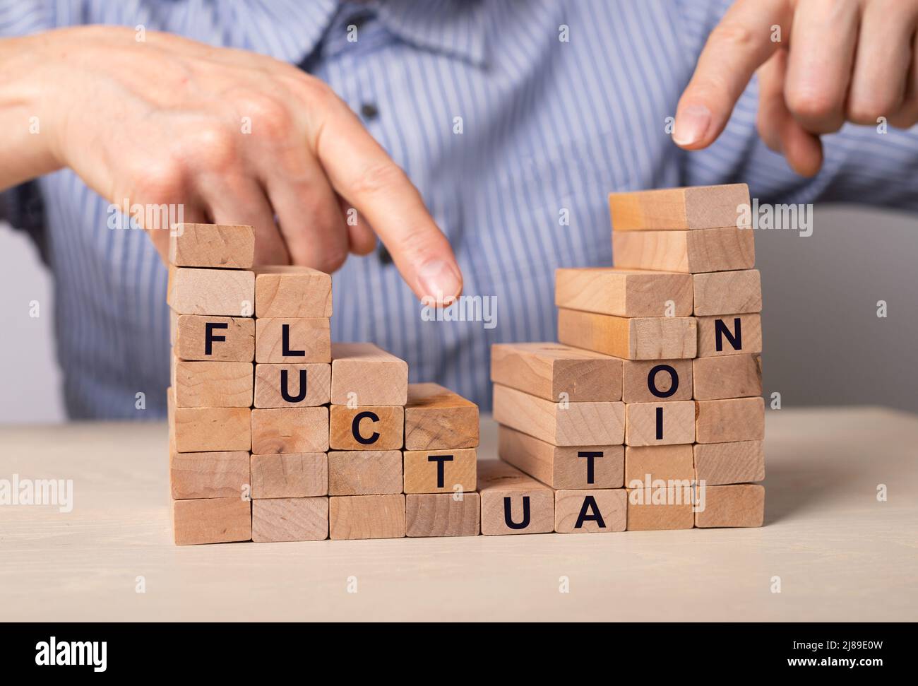 Fluctuation, word on abstract stock market graph. concept Stock Photo ...
