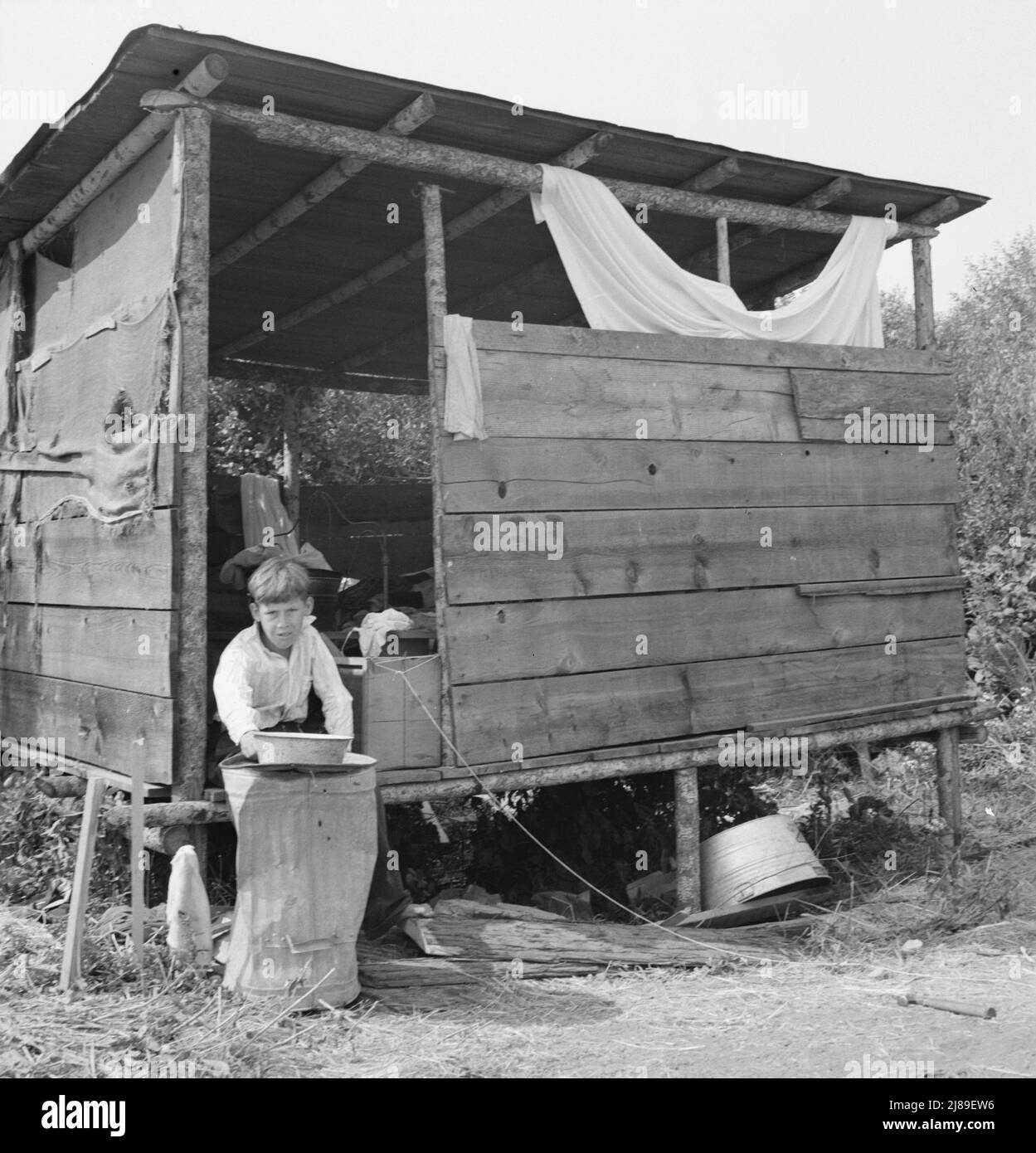 Rubbish picker child Black and White Stock Photos & Images - Alamy