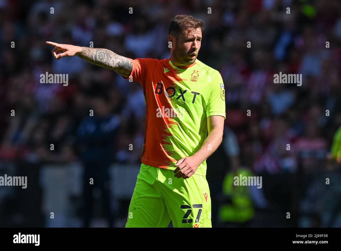 Steve Cook #27 of Nottingham Forest gives his team instructions Stock ...