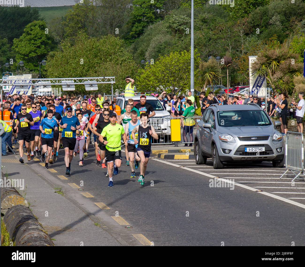 Runners of all ages taking part fund raising race. Rosscarbery, West ...
