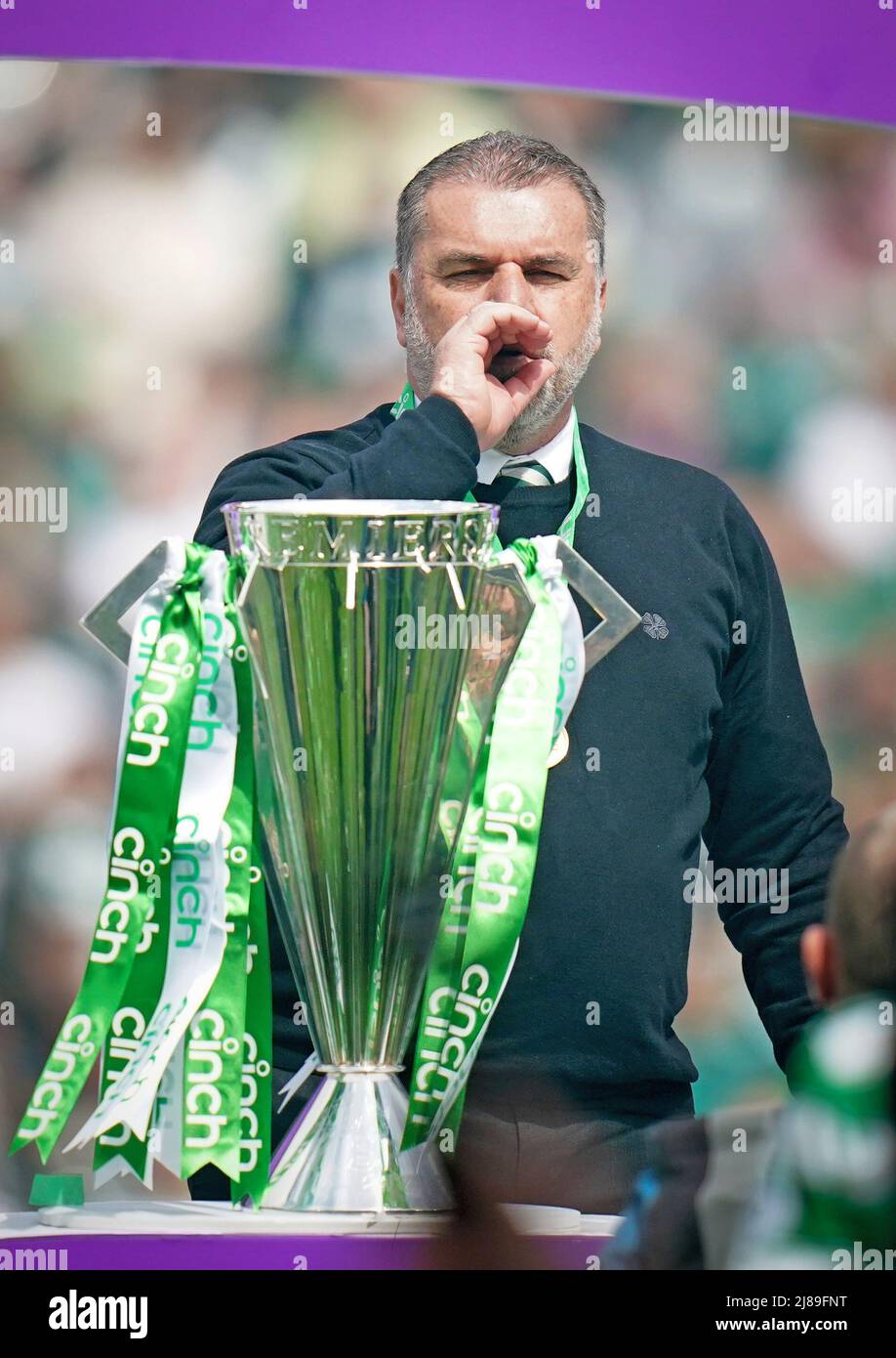 Celtic manager Ange Postecoglou celebrates with the league trophy after ...