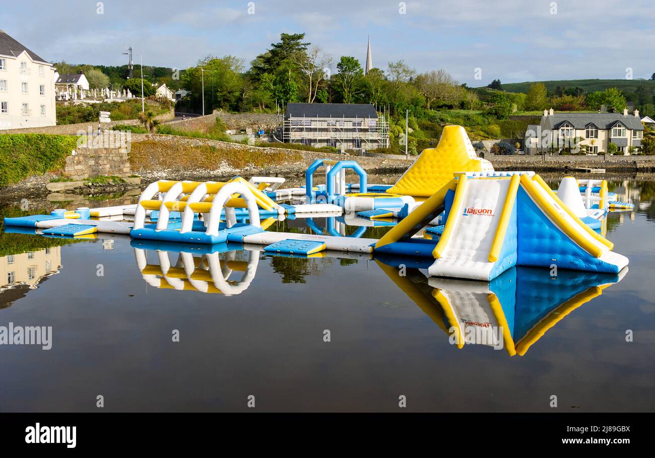 Floating activity centre reflecting in early morning still waters Stock ...