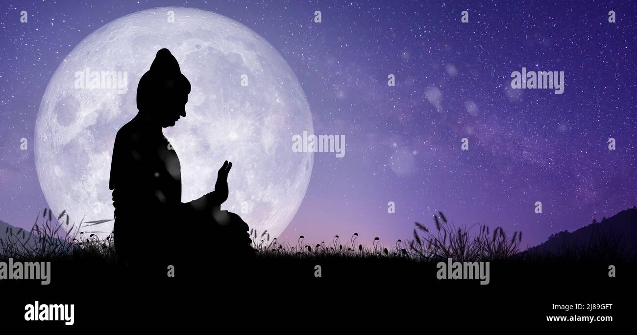 Silhouette of Buddha mediating with Full moon light at night. Magha ...