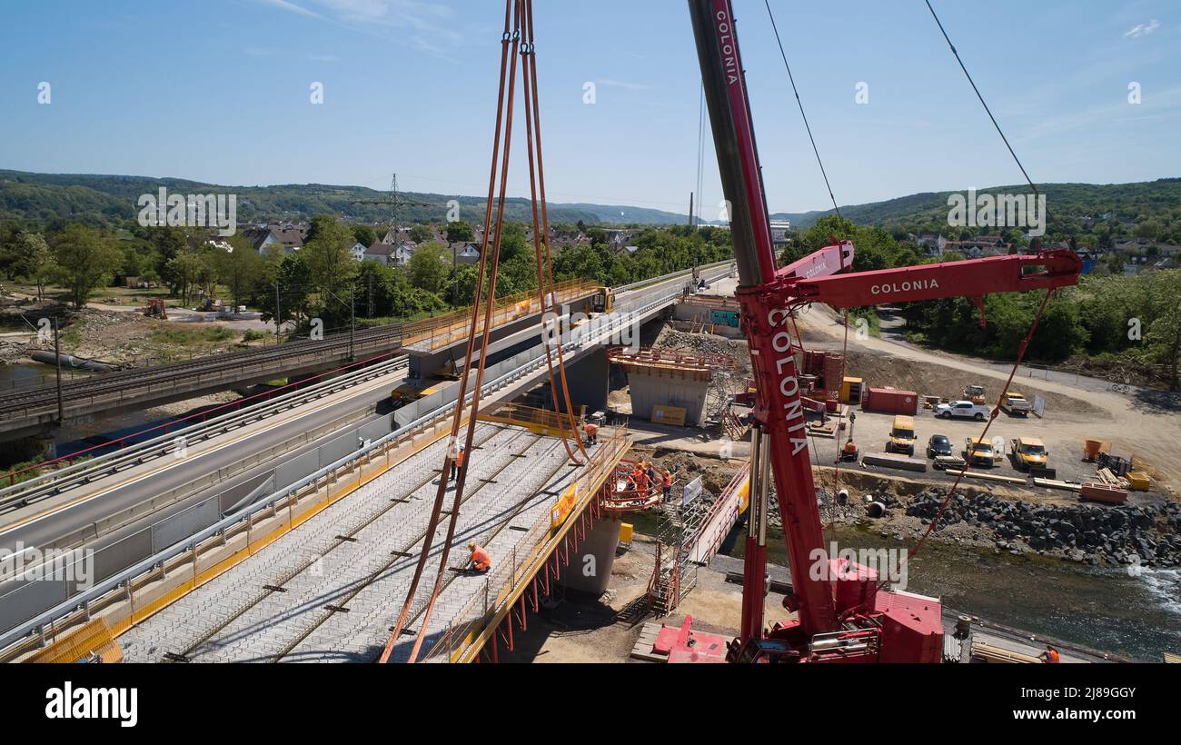 Sinzig, Germany. 14th May, 2022. Two truck-mounted cranes have begun ...