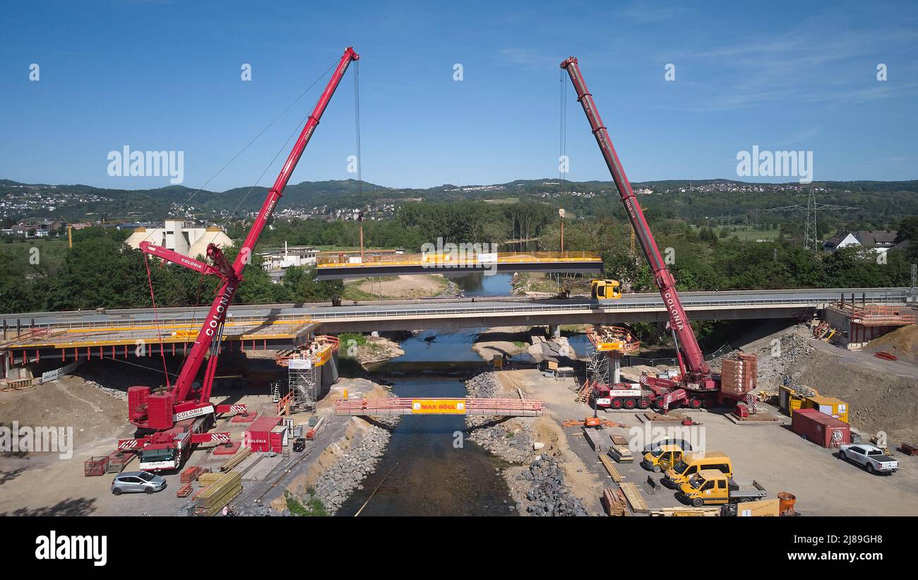 Sinzig, Germany. 14th May, 2022. Two truck-mounted cranes have begun ...