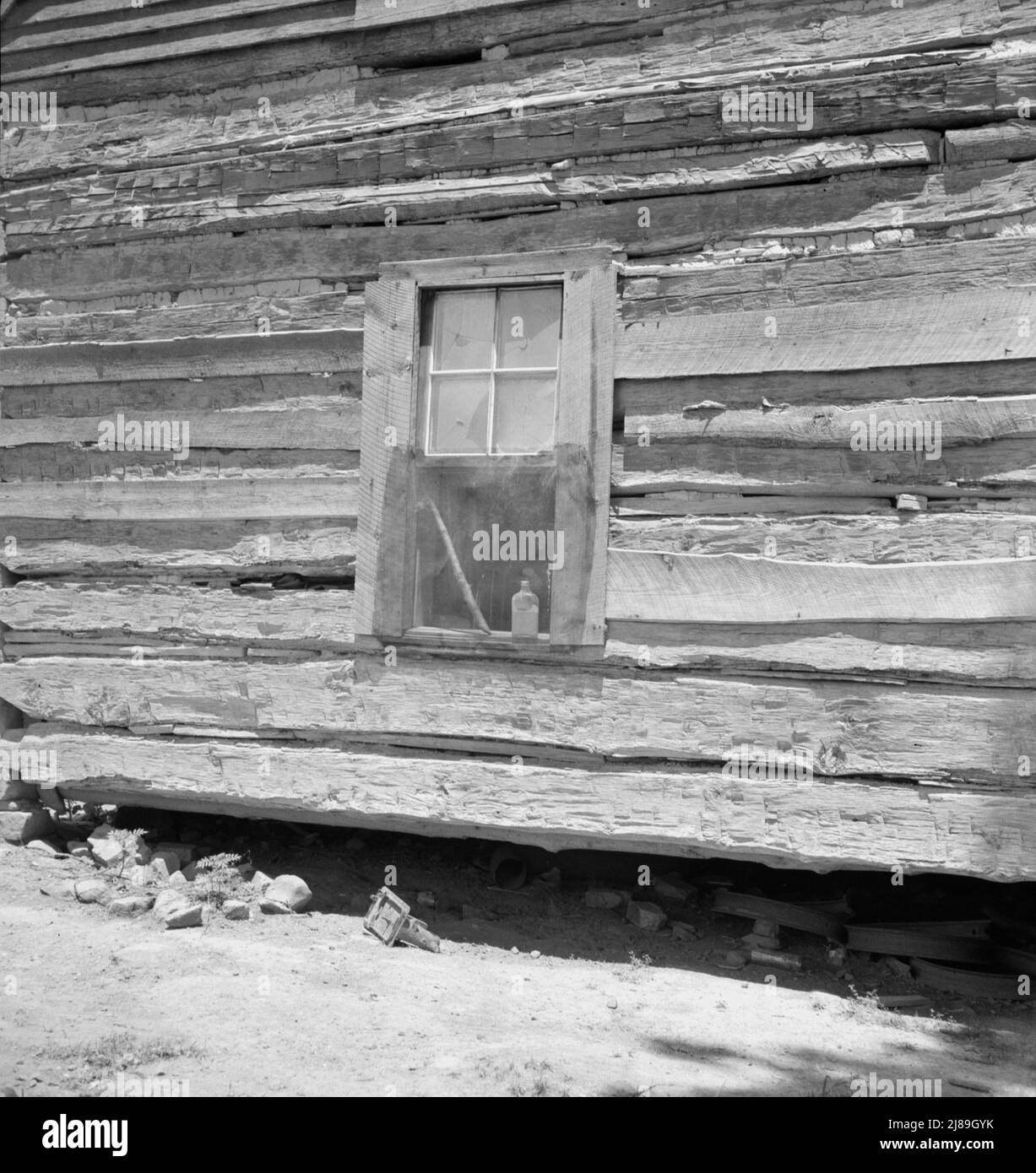 Log house of rural non-farm family. House is over fifty years old ...