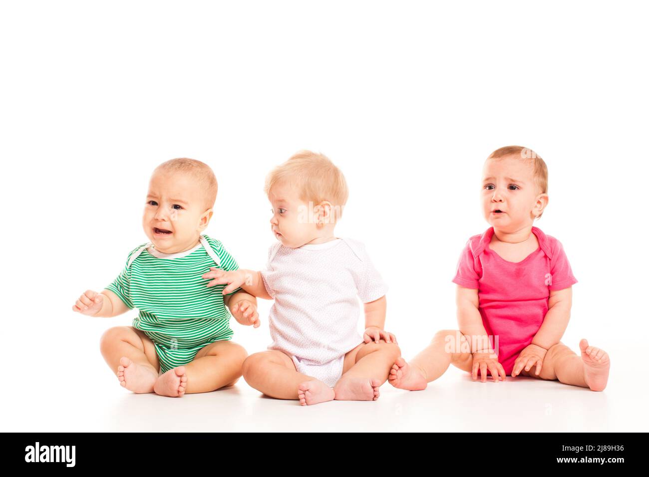 Three babies isolated hi-res stock photography and images - Alamy