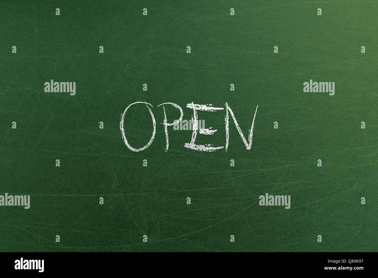 Green chalkboard with open word placard in cafe. Banners and signs ...