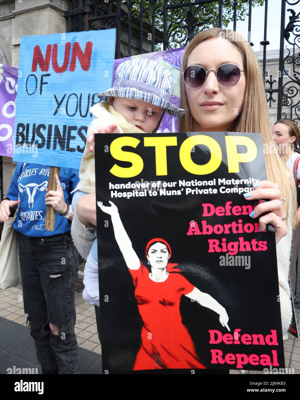 Six-month-old Donnacha Moon-Hannon and Aileen Moon take part in a ...