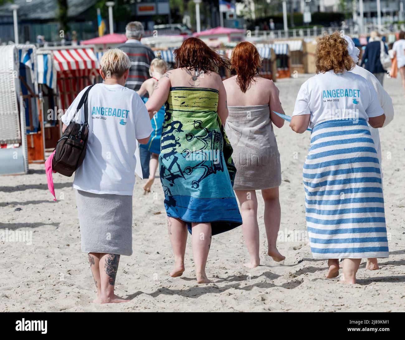 14 May 2022, Schleswig-Holstein, Travemünde: Four women walk along the ...
