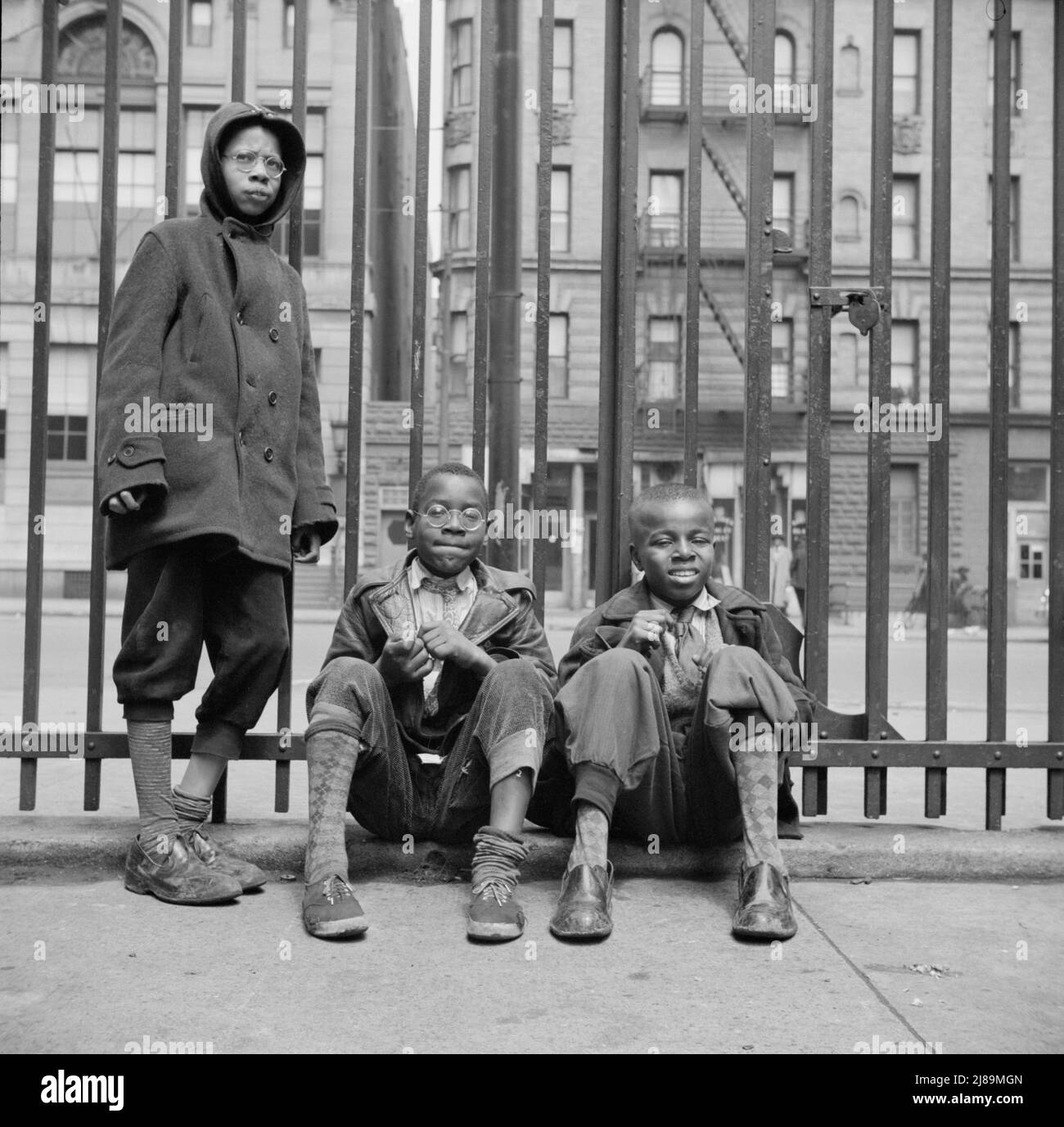 New York, New York. Three boys who live in the Harlem area Stock Photo ...