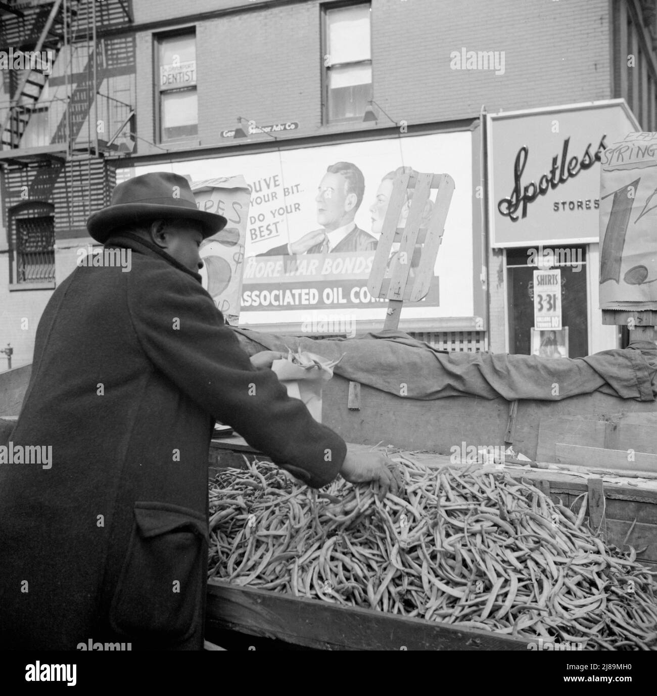 New York, New York. Street peddler in the Harlem section Stock Photo ...