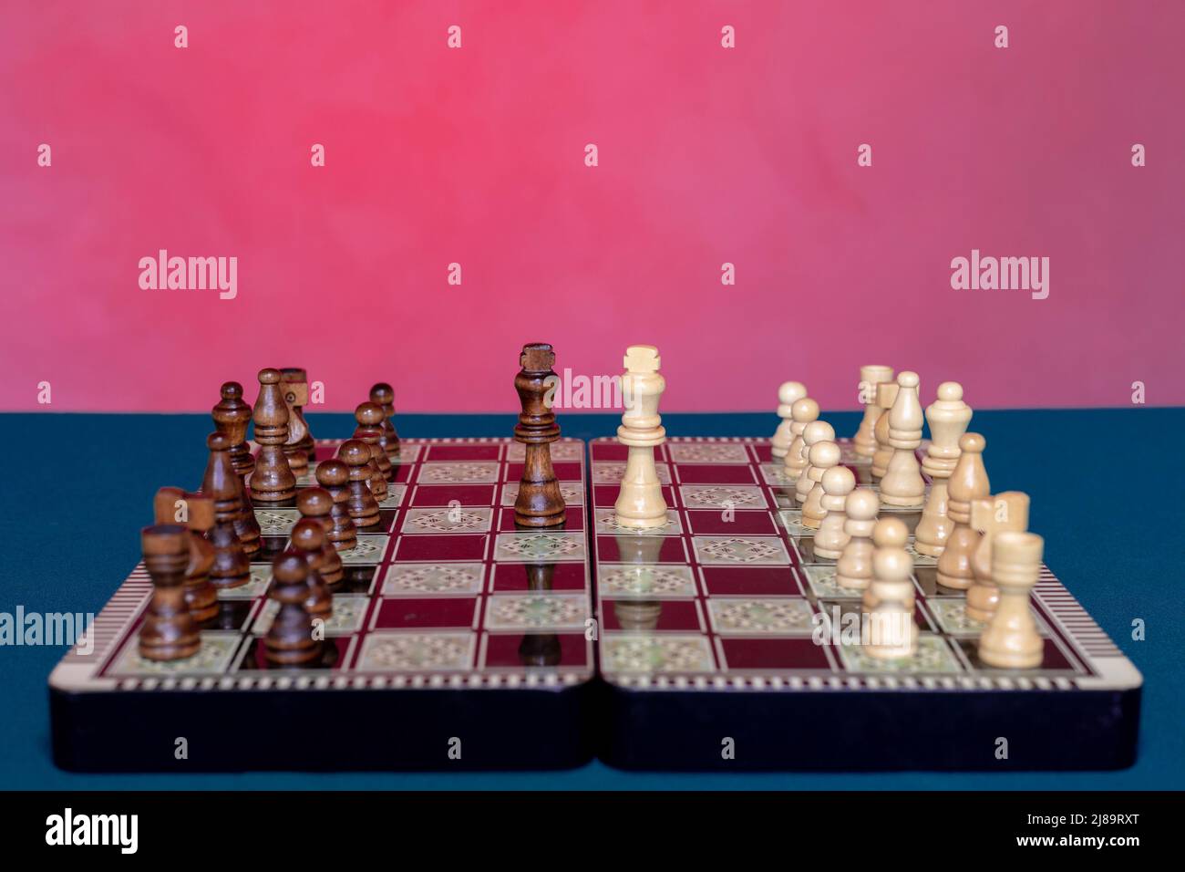 Two kings met on a chess board Stock Photo - Alamy
