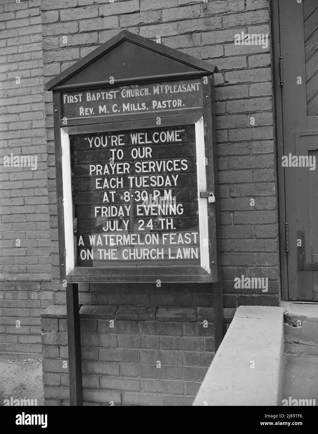 Sign in front information Black and White Stock Photos & Images - Alamy