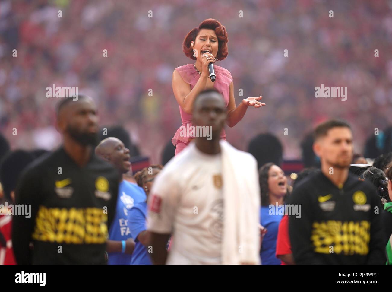Singer Raye performs the national anthem prior to the Emirates FA Cup ...