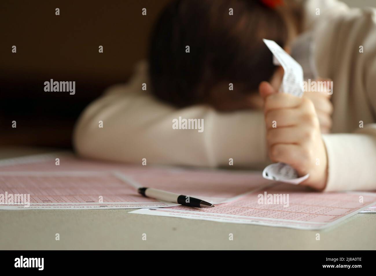 Sad person lottery ticket hi-res stock photography and images - Alamy
