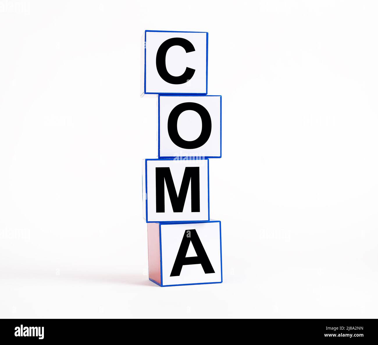 Coma word on medical cubes on white background Stock Photo - Alamy