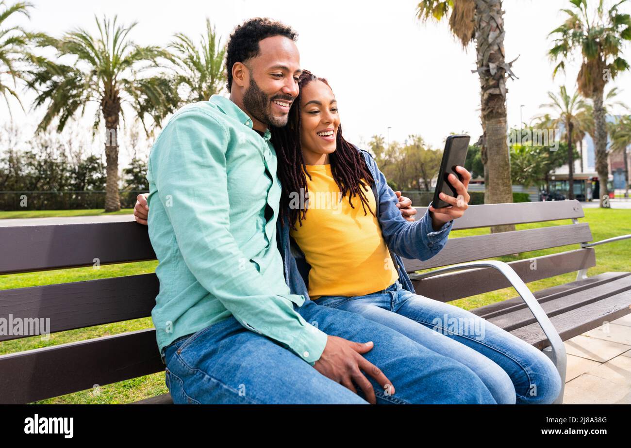 Joyful man woman tourists sit hi-res stock photography and images - Alamy