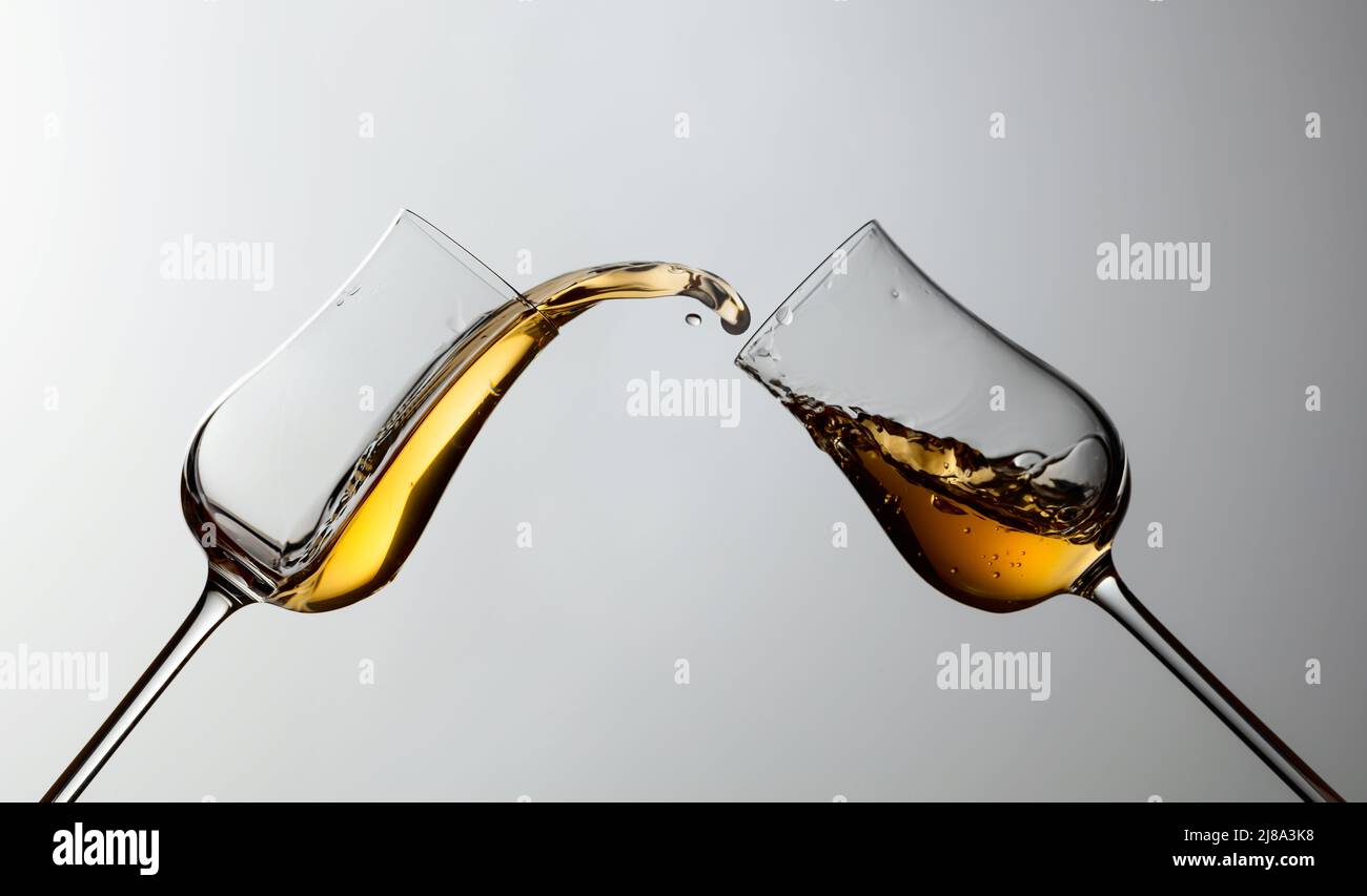 The drink spills out of the glass. Concept of the theme of premium ...