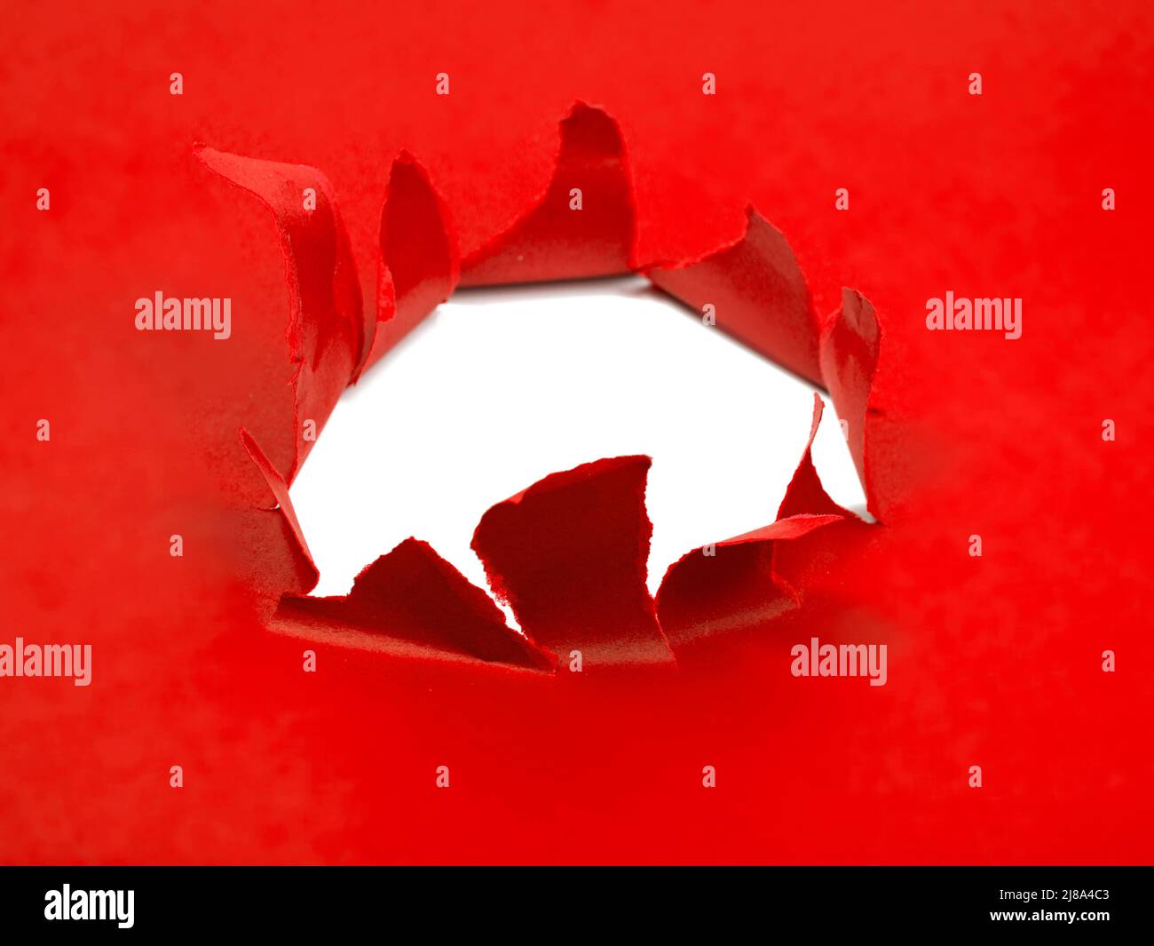 Red crushed torn paper with hole copyspace background for idea Stock ...