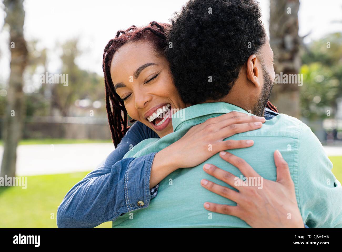 Beautiful happy hispanic latino couple of lovers dating outdoors ...