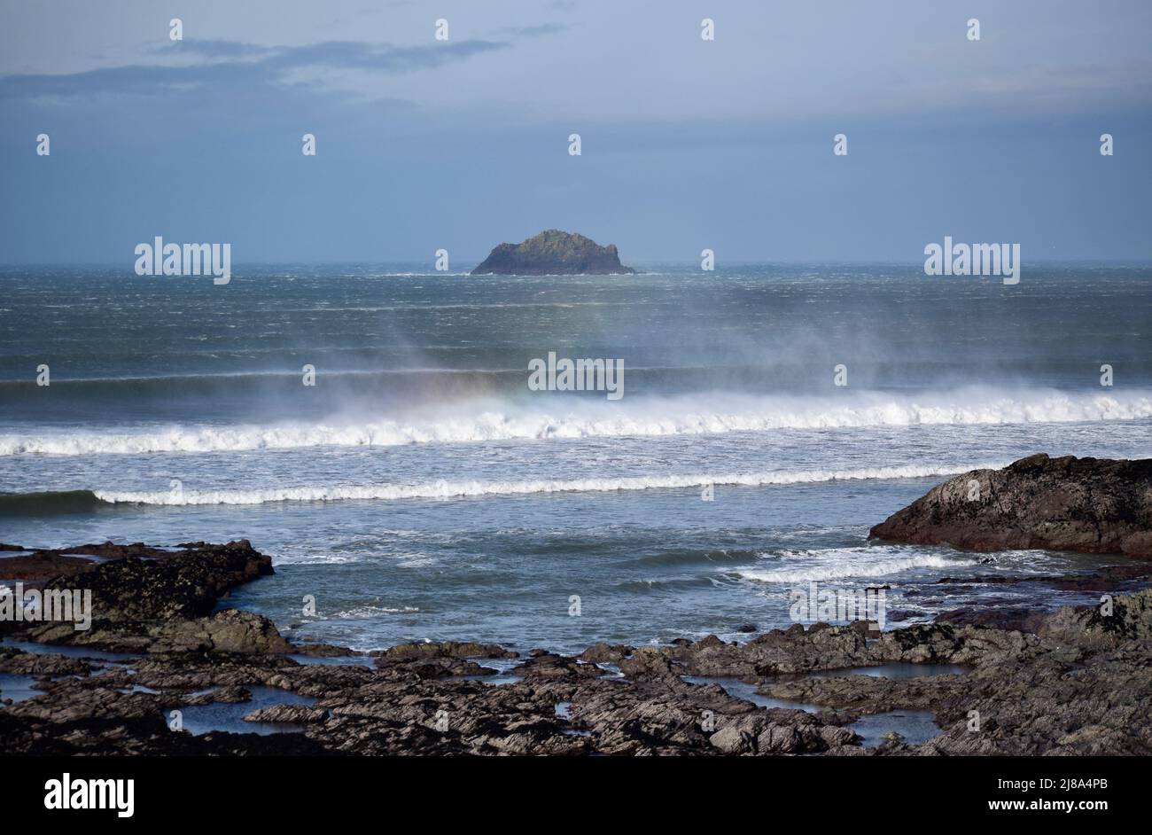 Rainbow waves at Greenaway Beach, near Polzeath, Cornwall Stock Photo ...