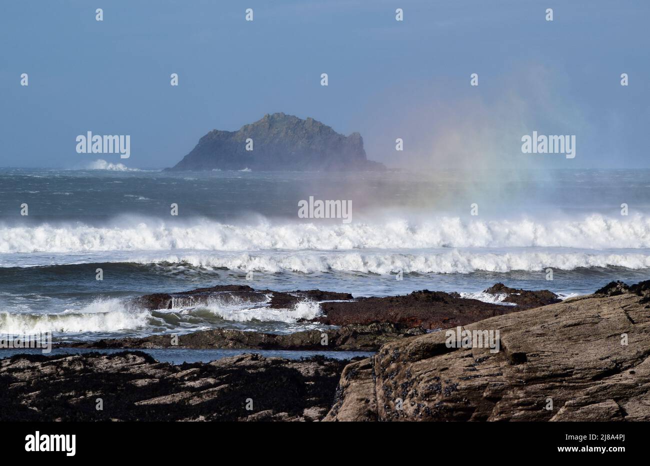 Rainbow waves at Greenaway Beach, near Polzeath, Cornwall Stock Photo ...