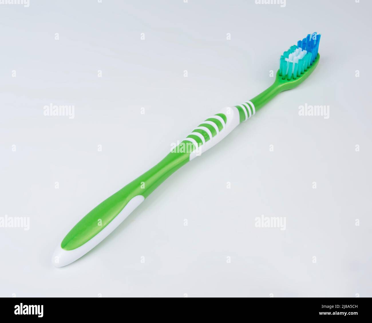 Green toothbrush hi-res stock photography and images - Alamy