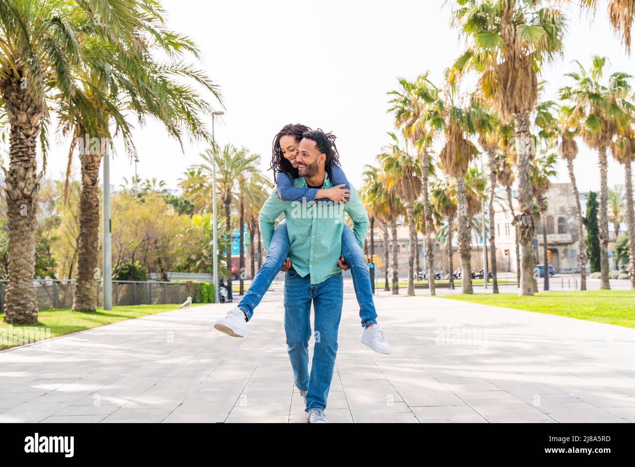 Beautiful happy hispanic latino couple of lovers dating outdoors ...