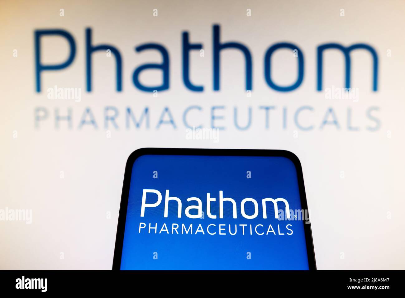 In this photo illustration the Phathom Pharmaceuticals logo seen displayed on a smartphone and ...
