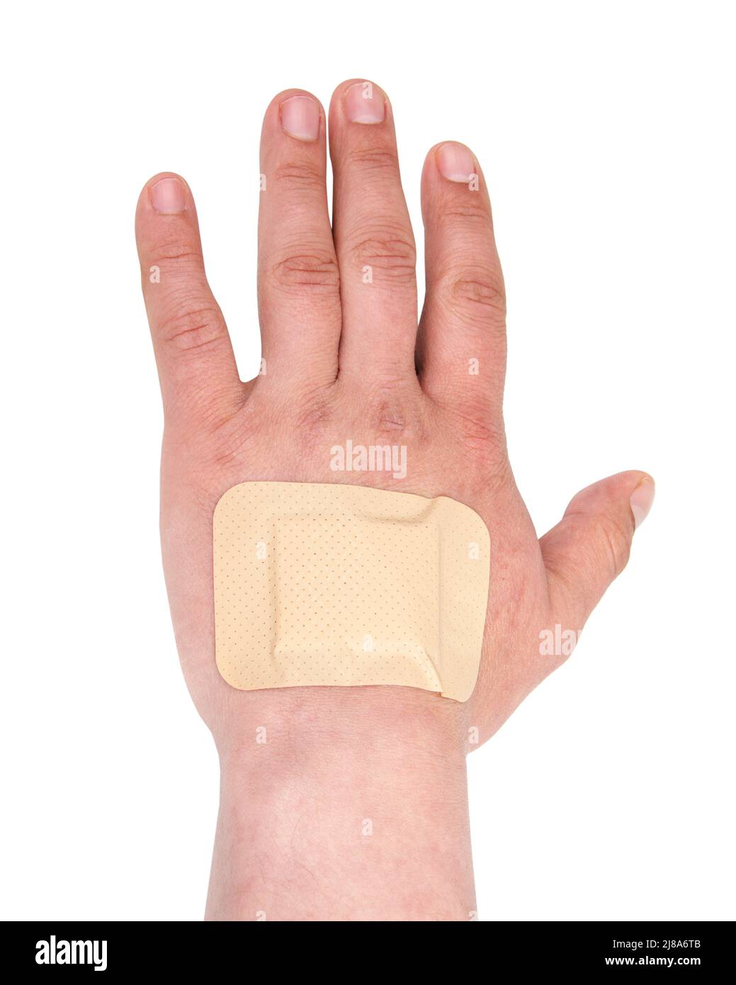 Medical big elastic plaster on man hand isolated on the white ...